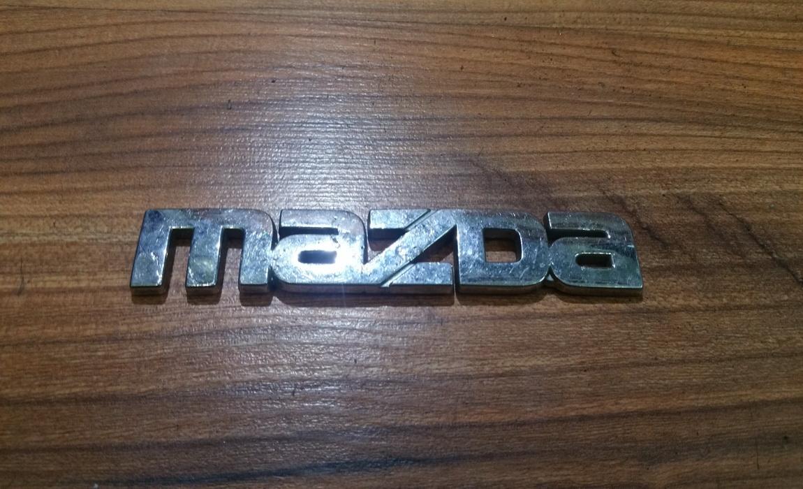 n/a Rear Emblem Mazda 323 1988 1.1L - EIS00090590 | Used Auto Parts Shop